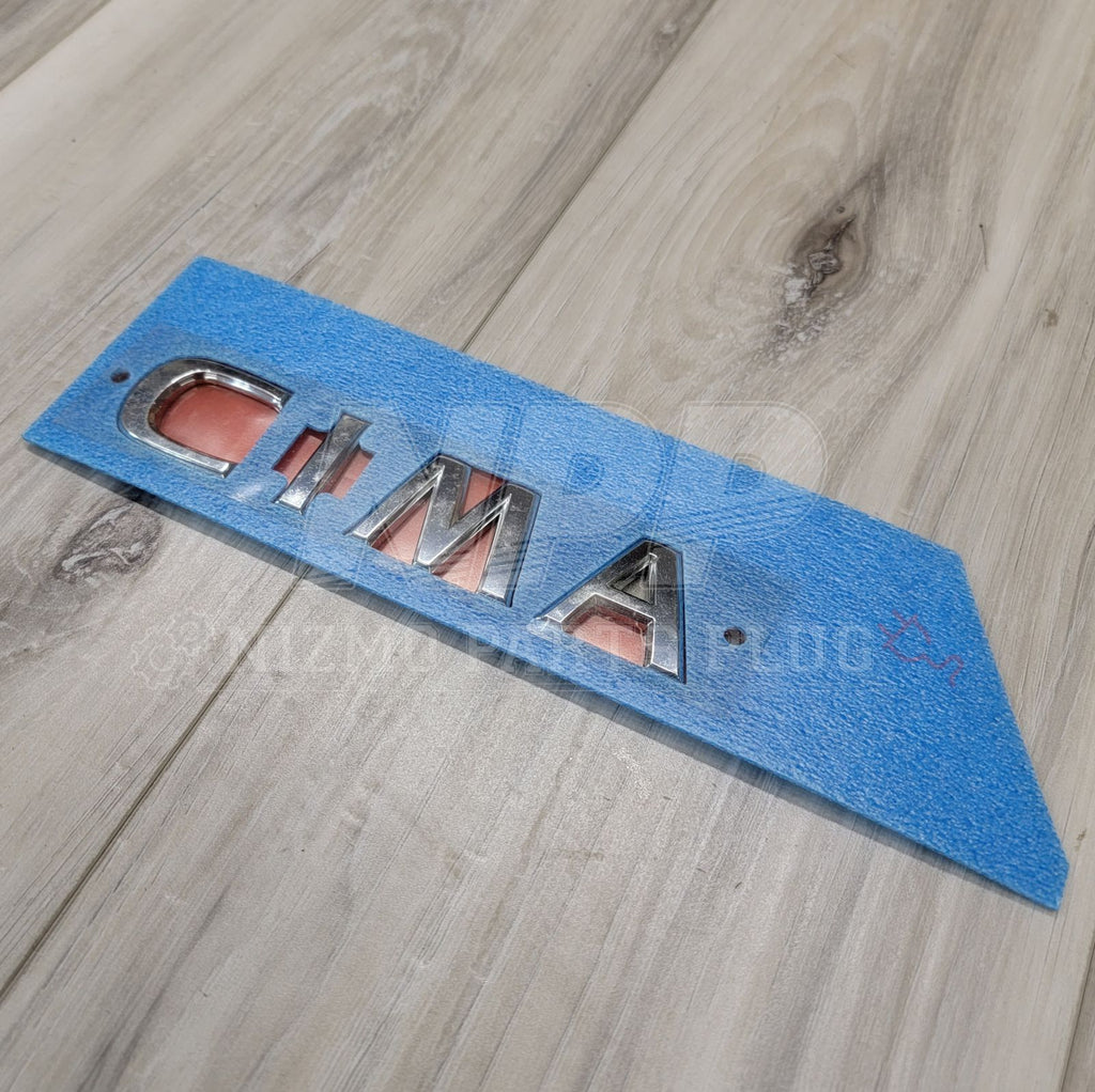 Q45 JDM Cima Trunk Emblem